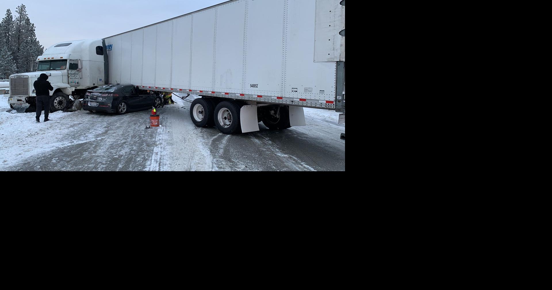 Car pinned underneath semi on I-90, driver injured | Local News | kxly.com