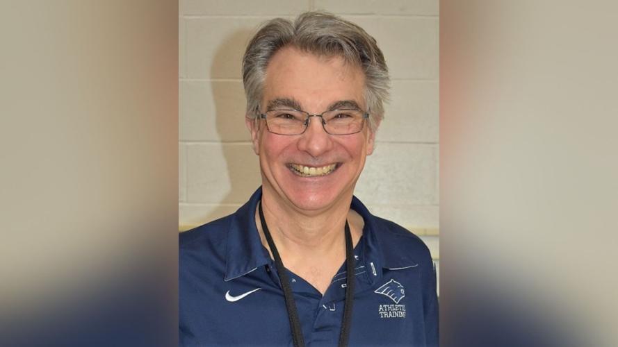 Longtime PE teacher dies during mountain biking excursion | News | kxly.com