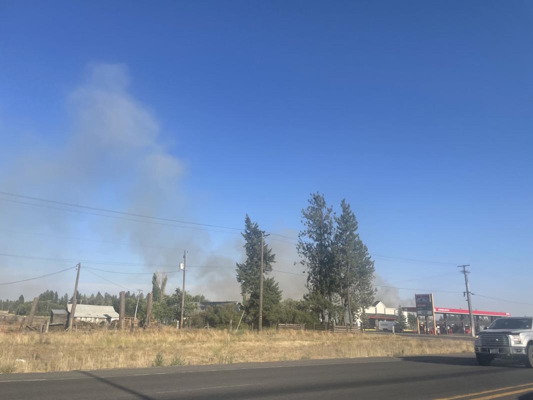Evacuations lowered for wildfire burning near Cheney | News | kxly.com
