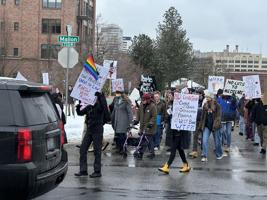 Hundreds march in downtown Spokane in protest against Trump ...