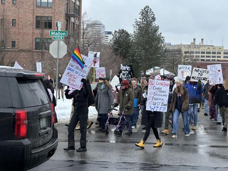 Hundreds march in downtown Spokane in protest against Trump ...