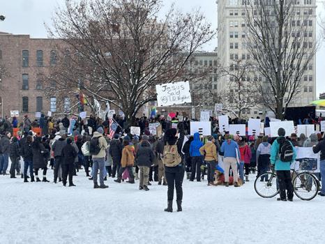 Hundreds march in downtown Spokane in protest against Trump ...