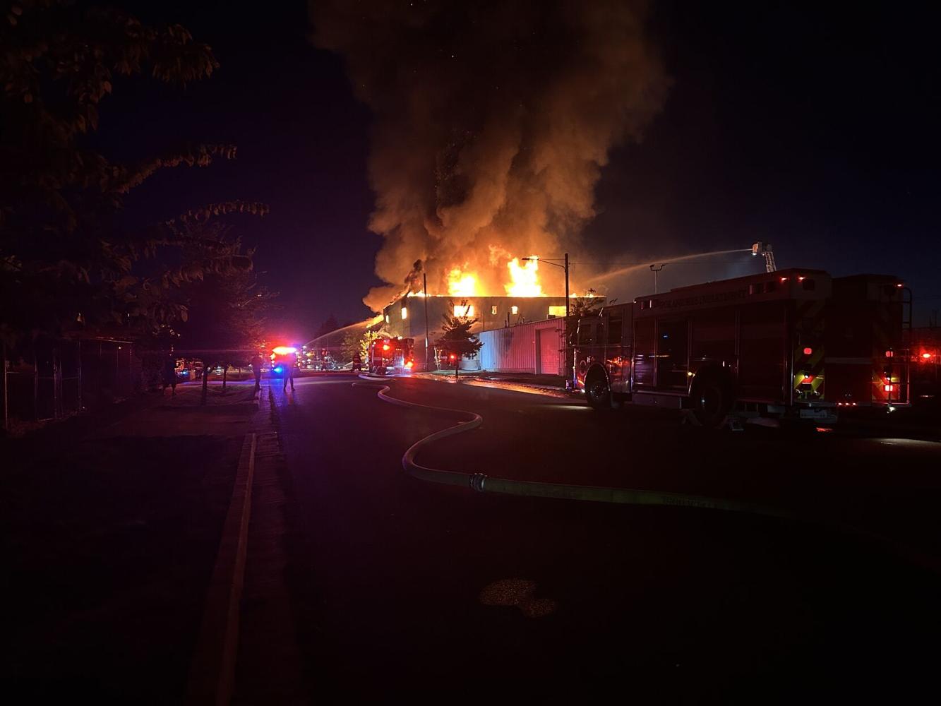 Firefighters battle large warehouse fire east of downtown Spokane ...