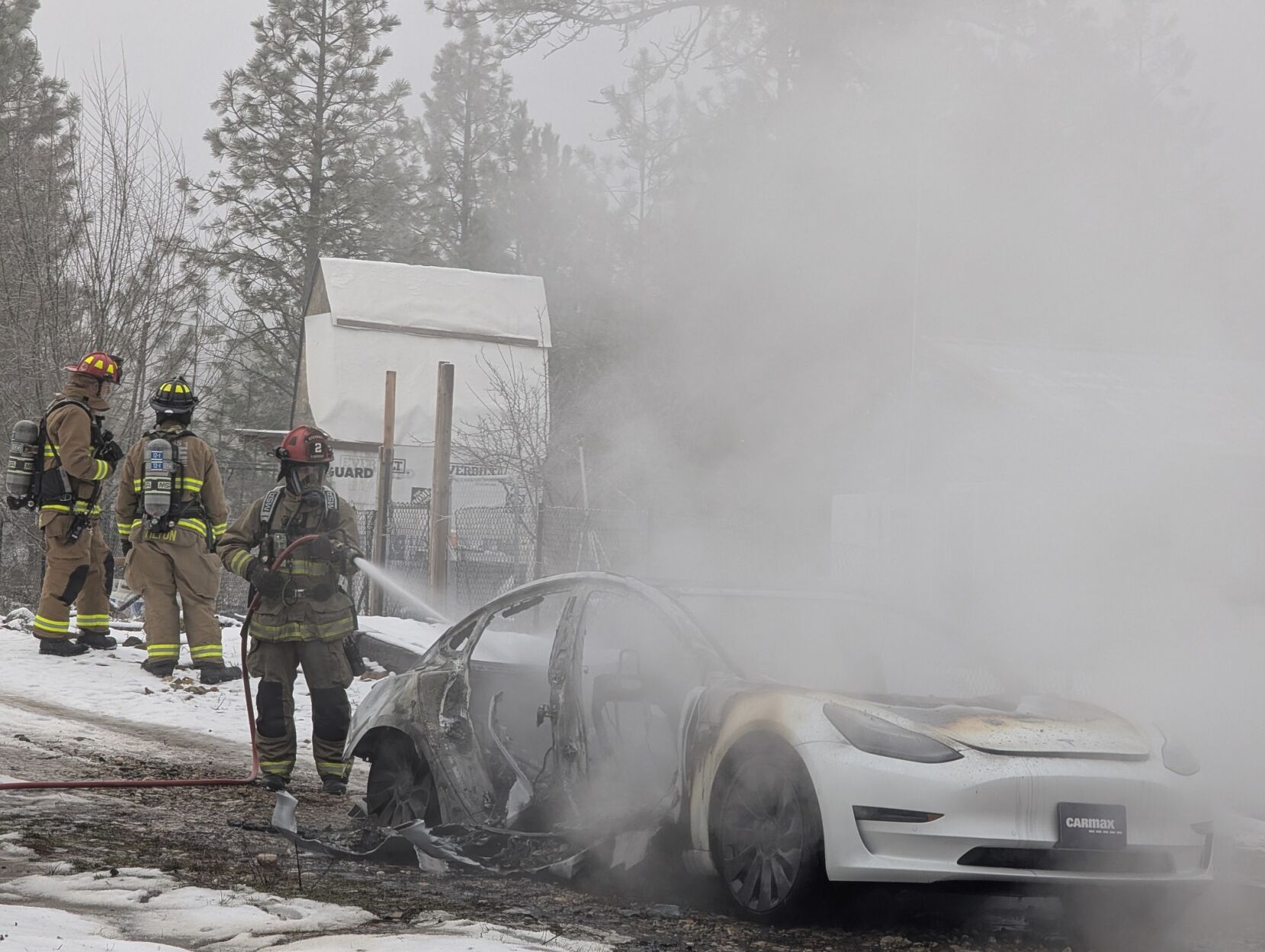 Firefighters extinguish Tesla deliberately set on fire in Ford | KXLY ...