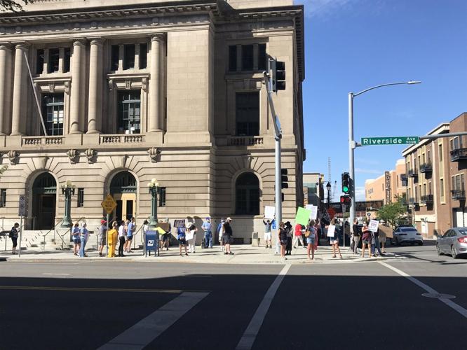 Spokane postal workers rally outside of downtown post office | Local ...