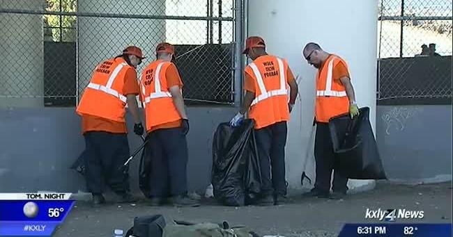 Inmates help pick up garbage left by homeless on city streets | Local ...