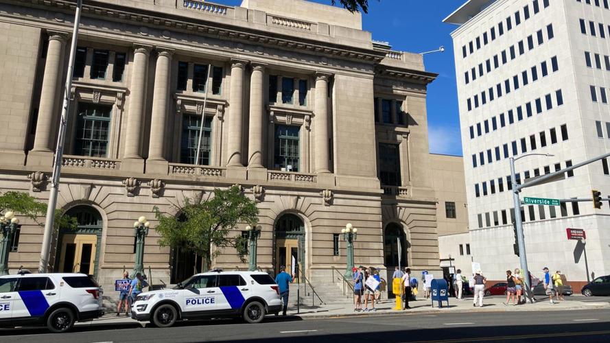 Spokane postal workers rally outside of downtown post office | Local ...