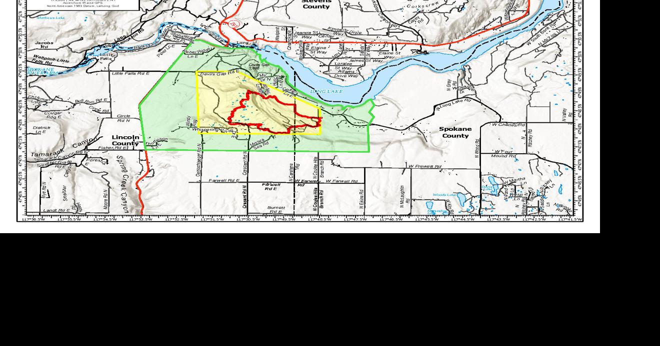 Evacuation levels reduced in fire burning along Lincoln, Spokane County ...