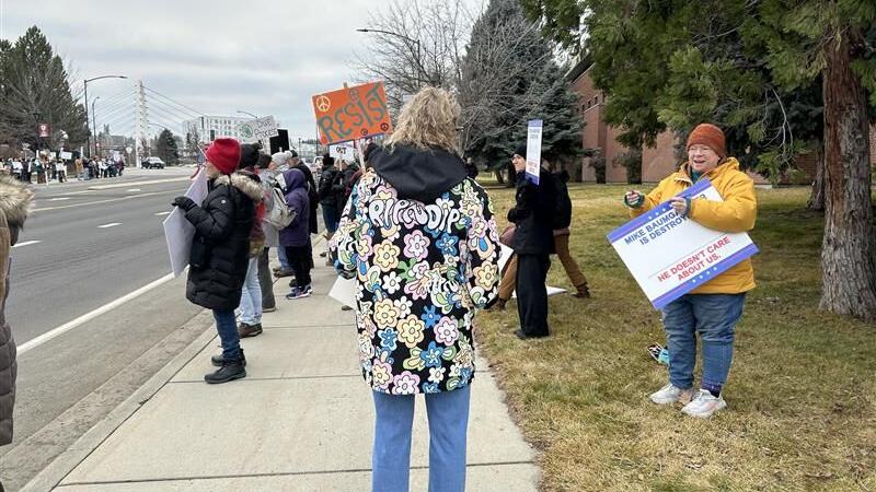 Protesters gather outside Rep. Baumgartner's office in national ...