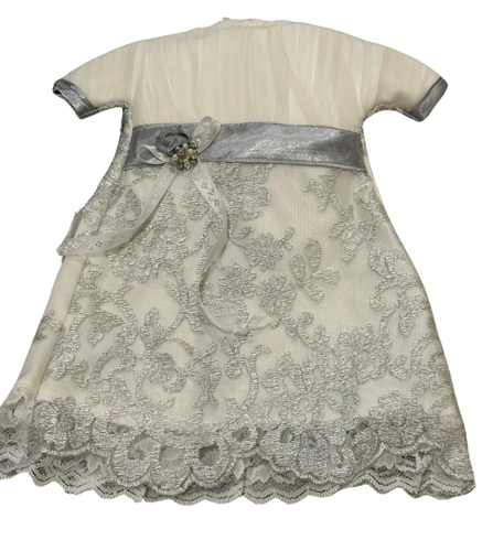 Hand-sewn bereavement outfits for grieving parents
