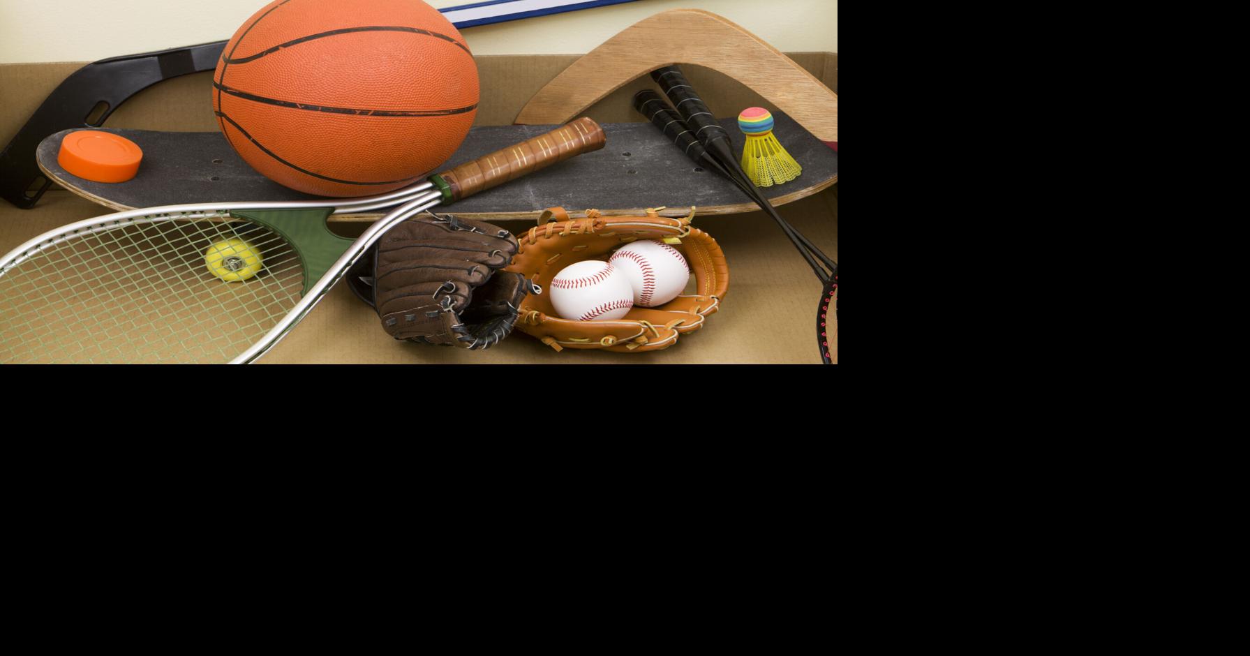 Different types of different sports equipment and balls