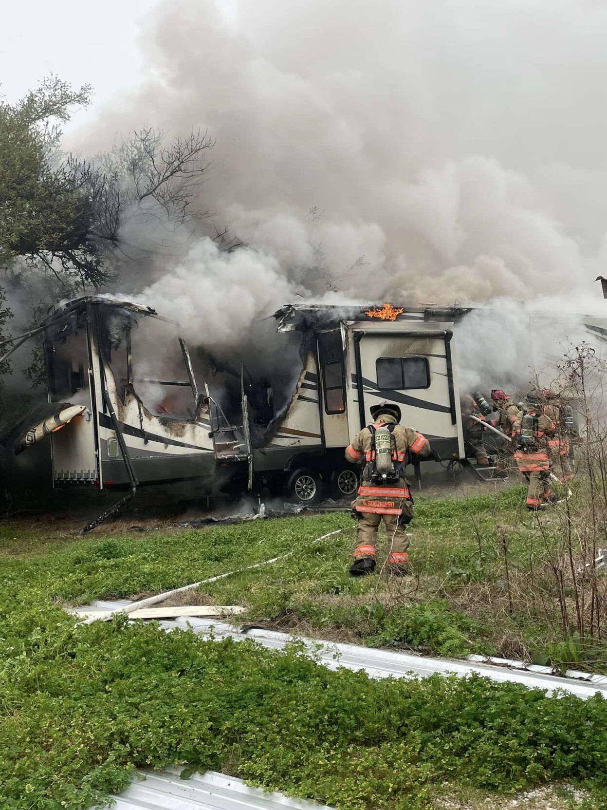 Local firefighters investigating suspected arson in camper fire | Local ...
