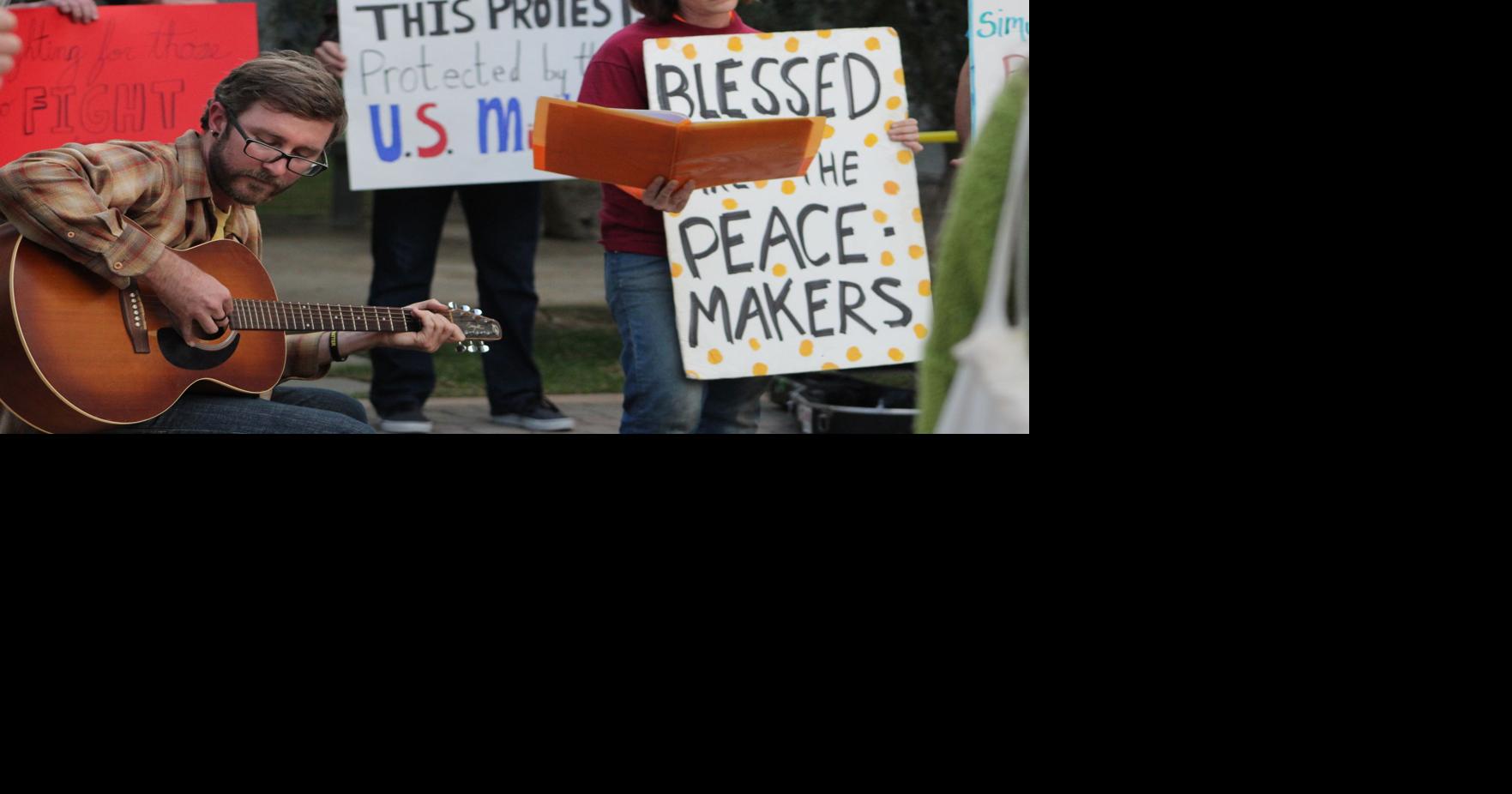 Students hold counter protest in response to anti-military protest held ...