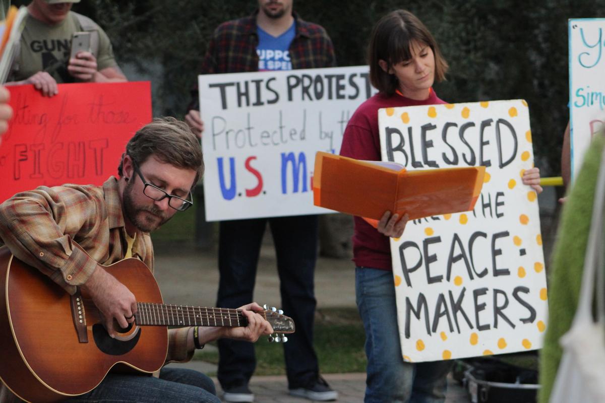 Students hold counter protest in response to anti-military protest held ...