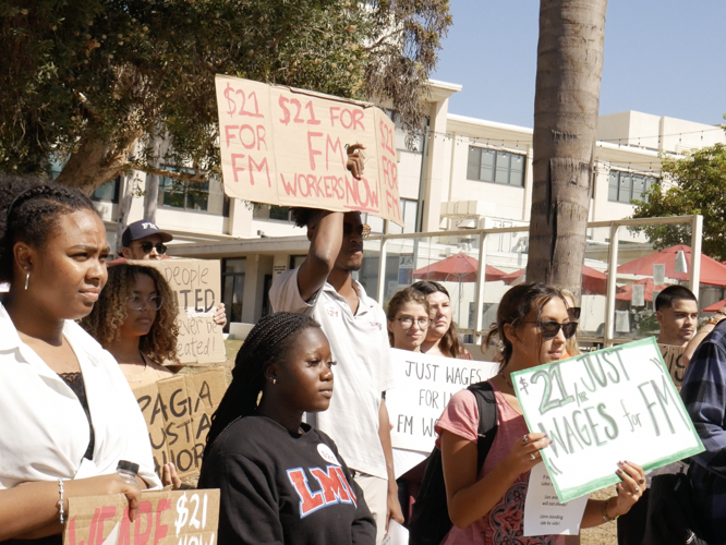 Students protest on behalf of FM employees outside University President ...