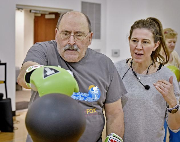 Boxing lessons help members of Willow Valley exercise class punch out ...