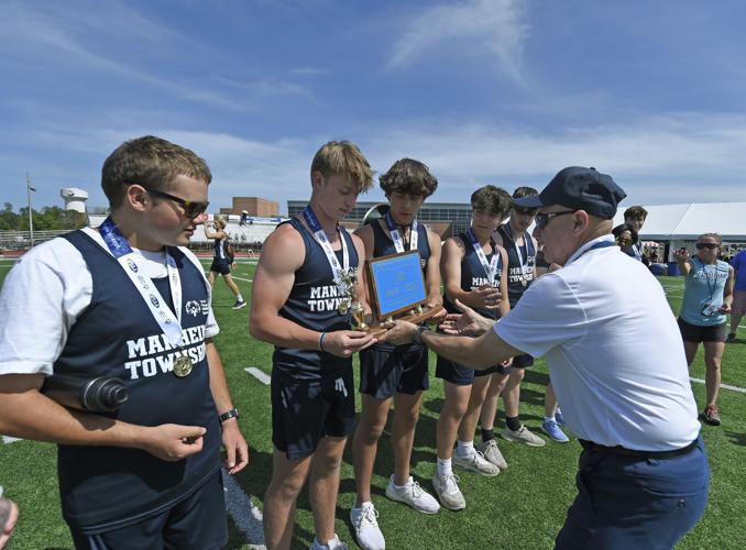 Raising the state championship trophy a special experience for Manheim ...