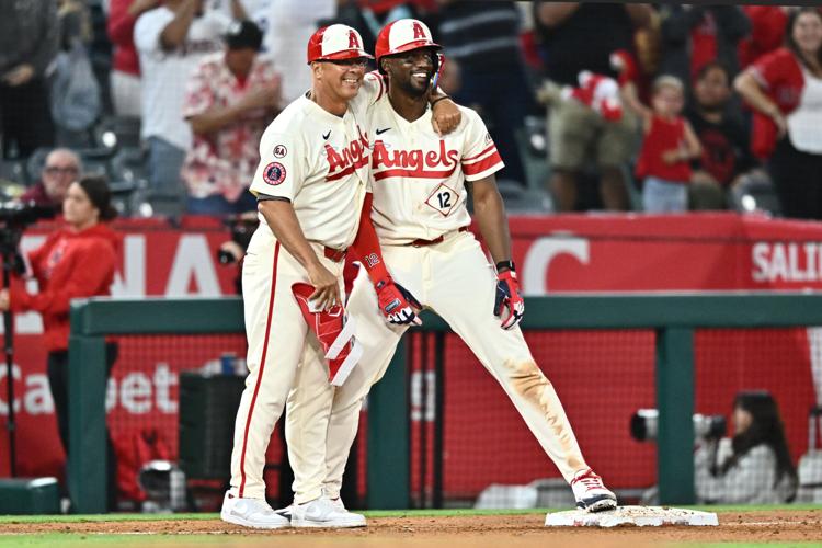Goodman's 3-run homer and Rumfield's sac fly help Rockies rally for 9-8 ...