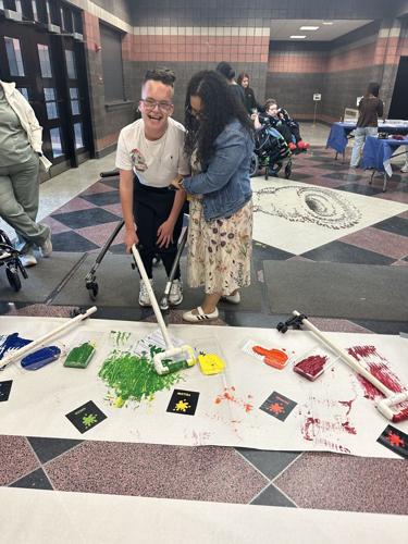 Adapted bicycle, interactive playground empower students at inclusive ...
