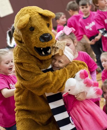 School's 'pink out' shows support for kindergartner battling cancer ...