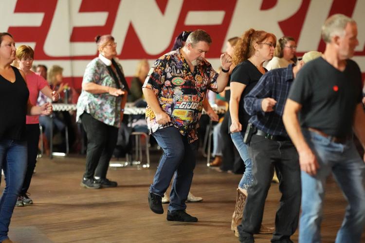Country line dancing event in Columbia helps raise money for animal ...