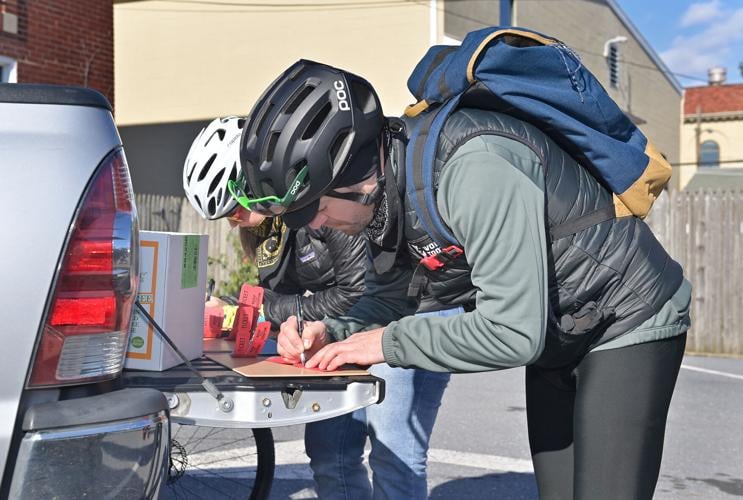 Lancaster bike lovers help gather Thanksgiving food items with ...
