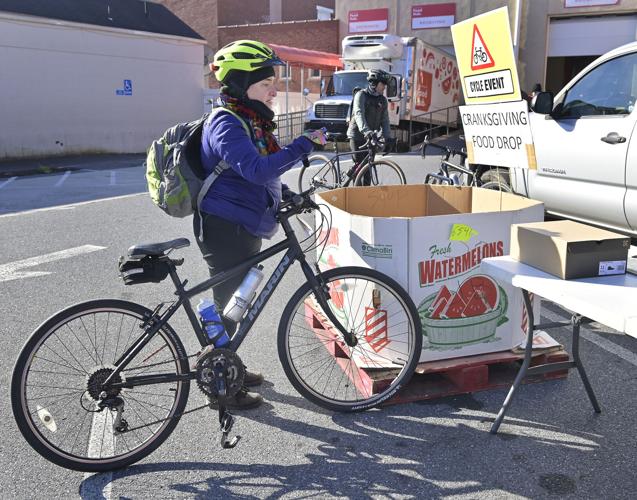 Lancaster bike lovers help gather Thanksgiving food items with ...