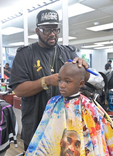 Champ's Barber Shop and School celebrates 20th anniversary with free ...