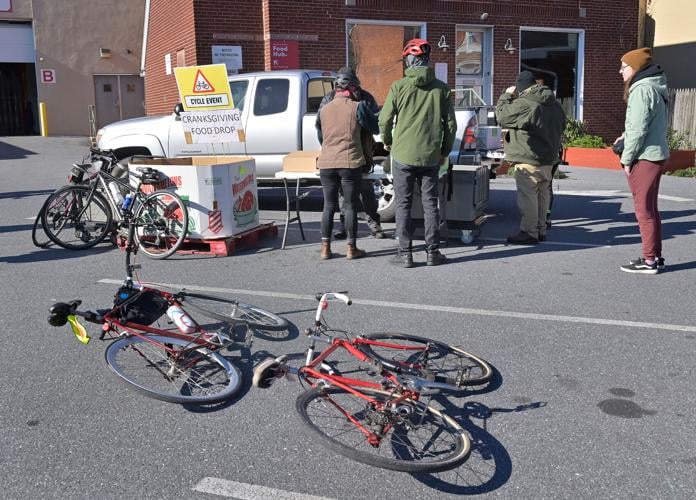 Lancaster bike lovers help gather Thanksgiving food items with ...