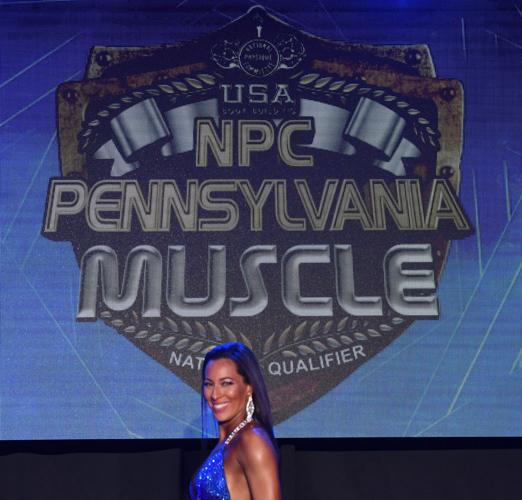 Bodybuilders take the stage at the NPC Pennsylvania Muscle competition ...