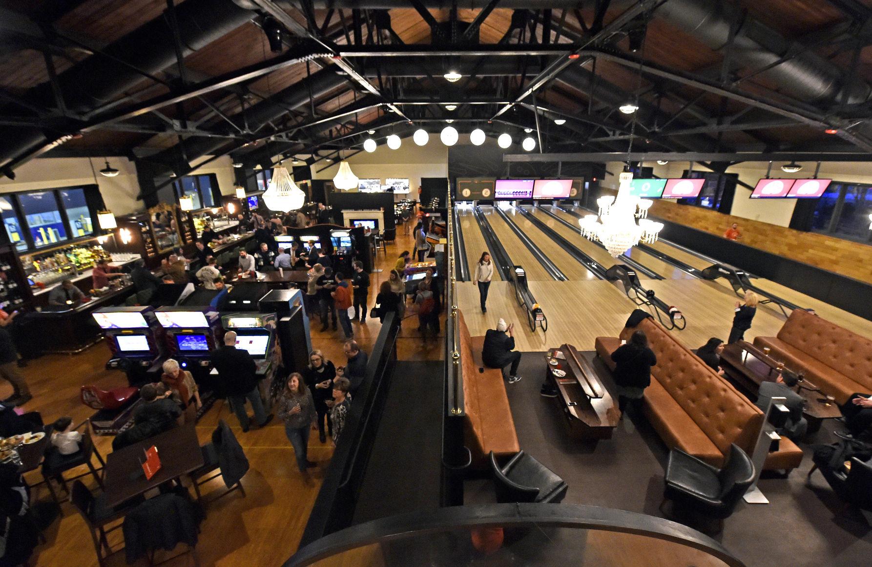 Decades provides bowling, arcade games and upscale food all under one ...