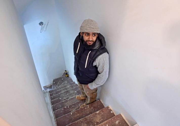 Second-chance construction crew transforming condemned houses in ...