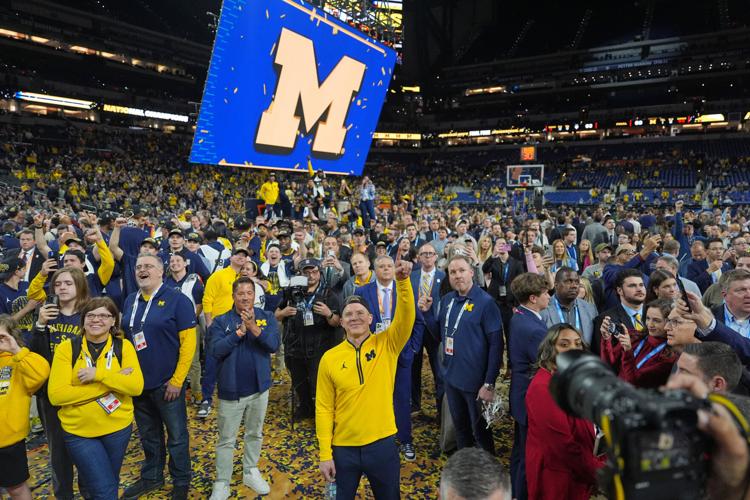 Mike Boynton promoted to interim coach at Michigan as Dusty May leaves ...