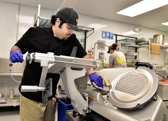 Pressroom employee Daniel Castellanos proves people with intellectual ...
