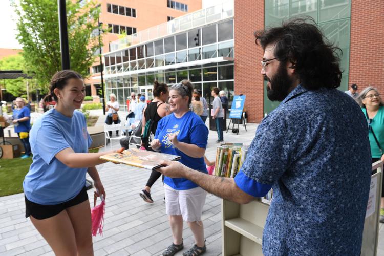 Books on parade to new Lancaster Public Library site [photos ...