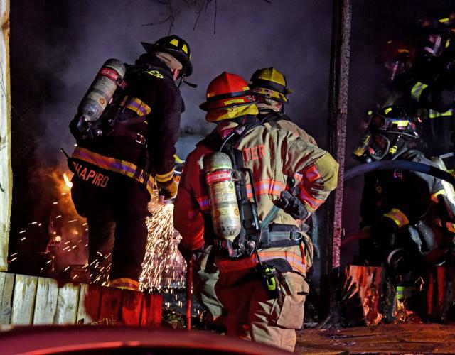 City firefighters extinguish car fire on Church Street near South Queen ...