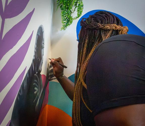 Inspirational women mural unveiled by powerlifter Tamara Wolcott at ...