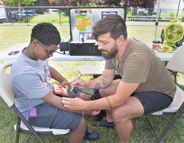 Community members turn out for Peace in the Streets block party [photos ...