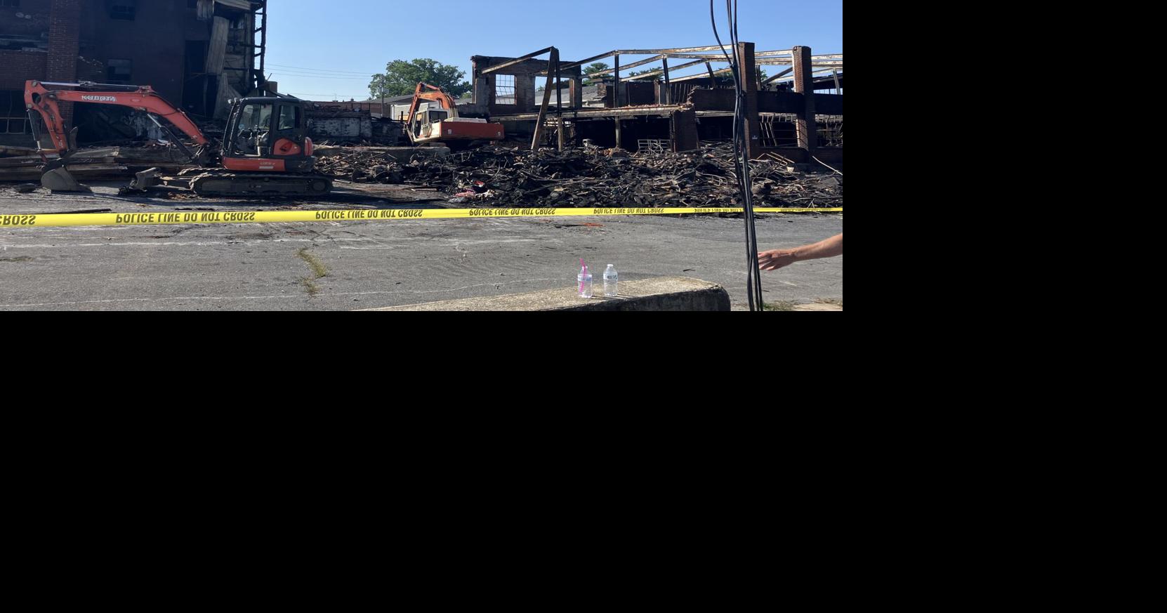 Crews begin work on demolishing main building after fire at Tollbooth ...