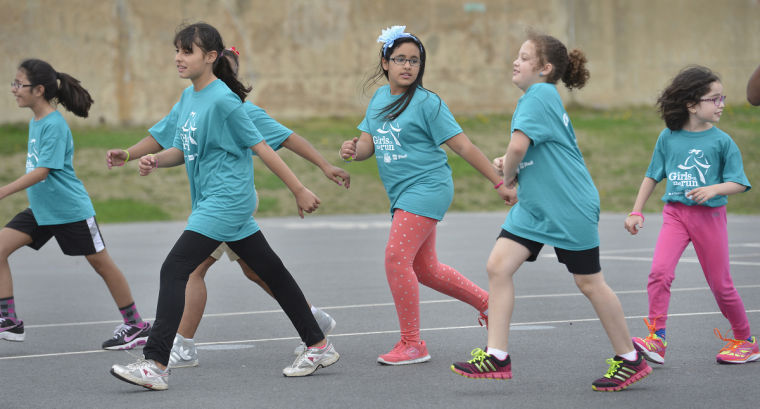 Lifting limits: Girls on the Run team adapts for disabilities | Local ...