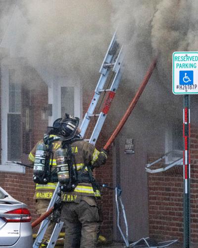 Fire crews battle 3-alarm fire that tears through block of downtown ...