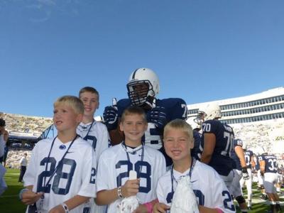 Miracle boy takes field as honorary captain of Penn State's football ...
