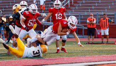 Wilson avoids 0-3 start, gets 5 TDs from Tommy Hunsicker in win over ...