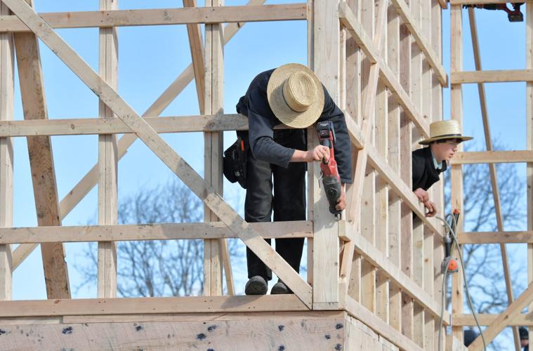 Starting again: Residents help to rebuild barn destroyed by fire in ...