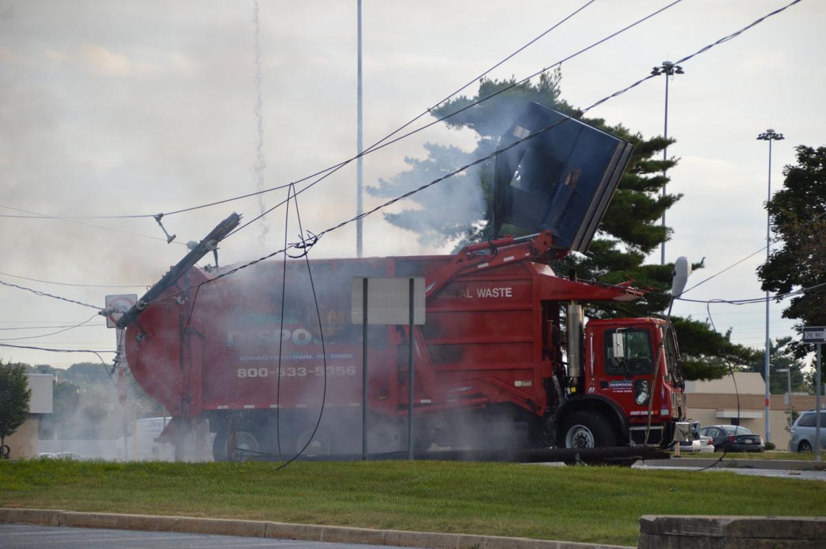 Power Outages Reported After Trash Truck Hits Utility Pole Catches On