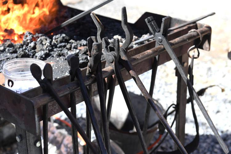 Forging steel at the Pennsylvania Guild of Craftsmen's blacksmith ...