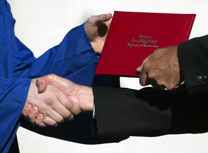 Octorara High School graduates walk across the stage Wednesday night ...