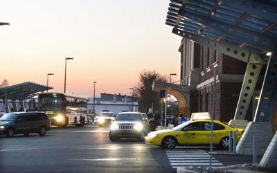 Curb cuts to accommodate buses at city train station | Business ...