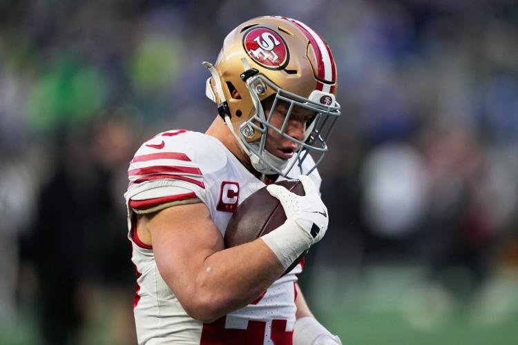 49ers star RB Christian McCaffrey injured in playoff game against ...