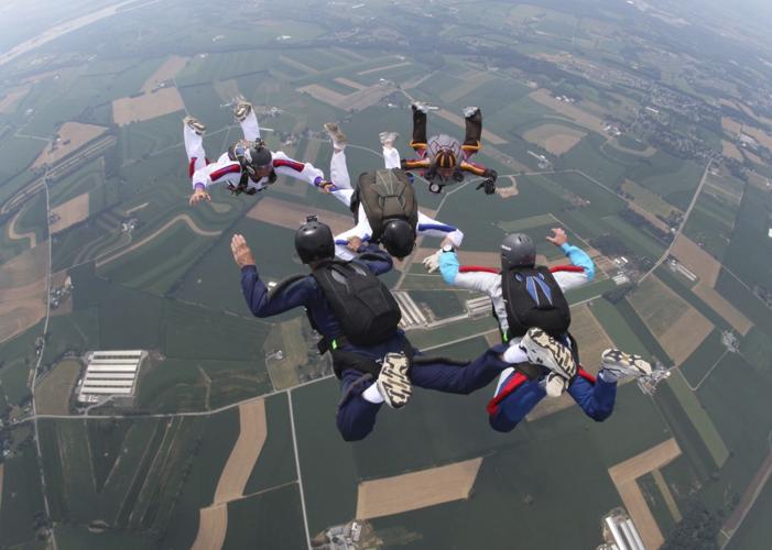 Group sets state skydiving record for Jumpers Over Seventy | Local News ...
